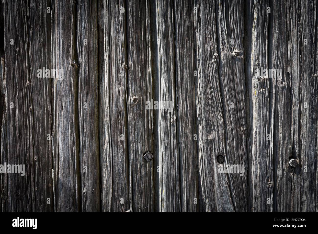 Wooden logs of an old house. Close-up. Weathered natural gray wood ...