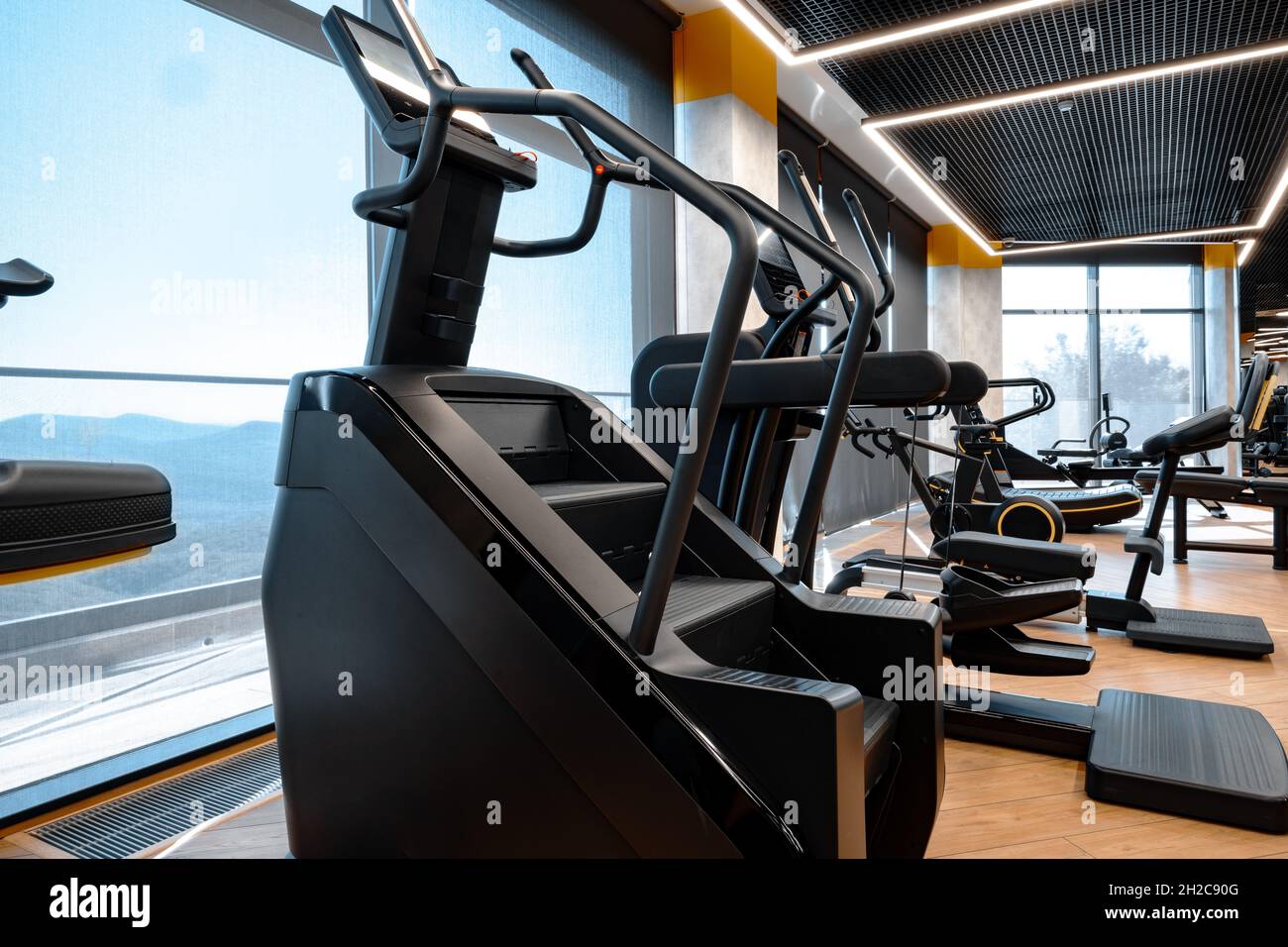 Modern gym interior with new fitness equipment Stock Photo - Alamy