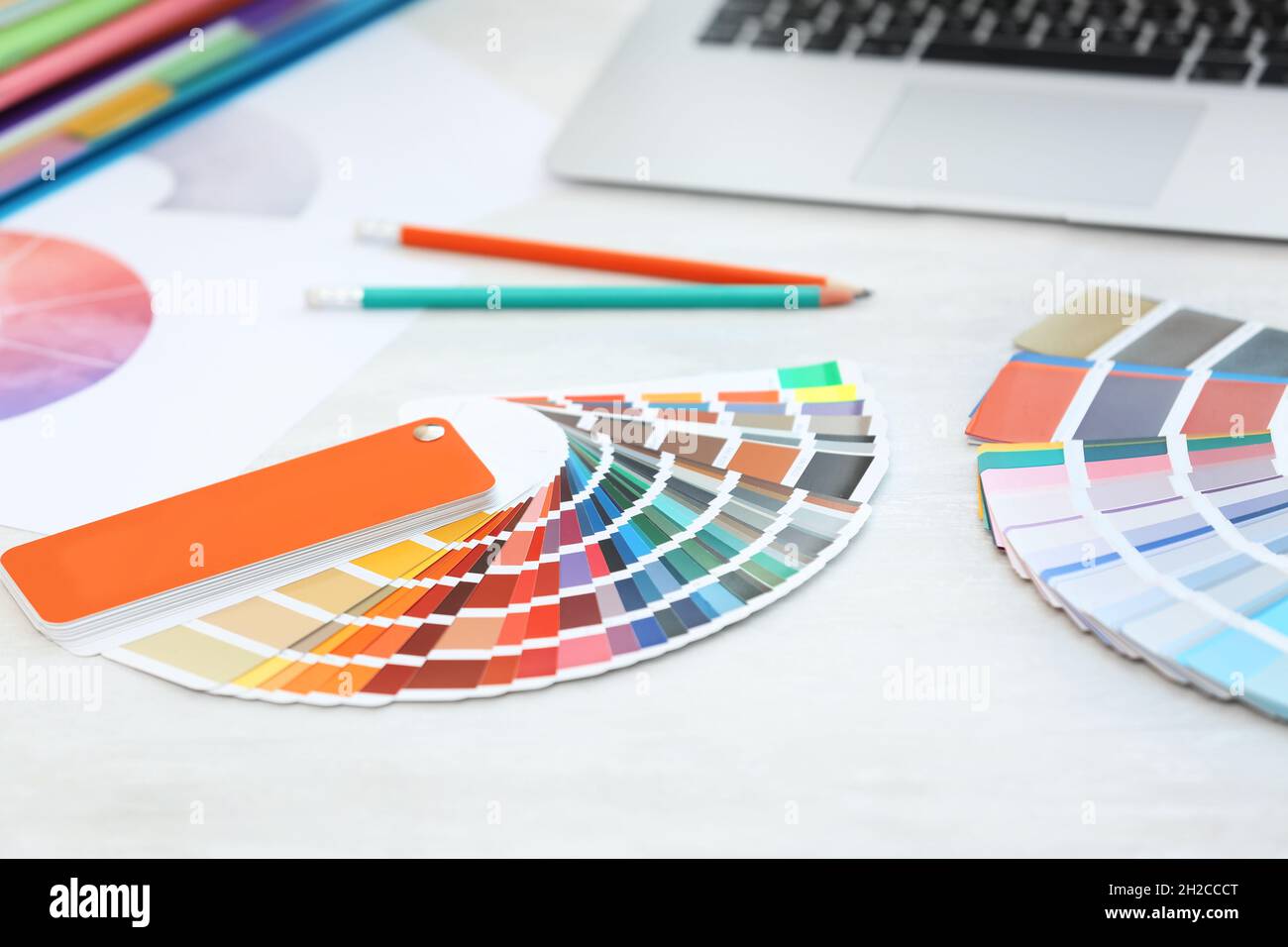 Paint color palette samples on table, closeup Stock Photo - Alamy
