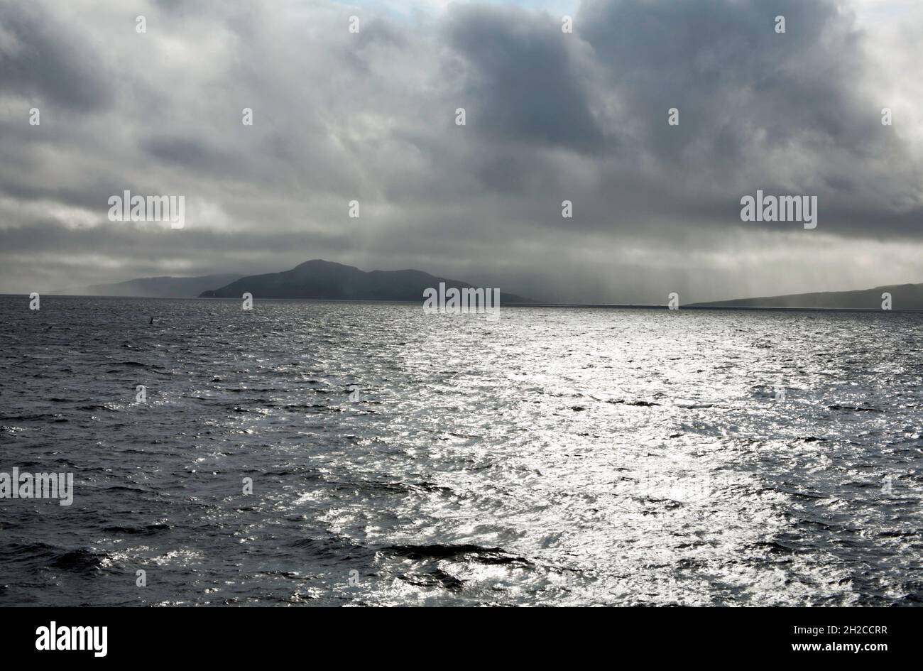Strom clouds passing over Holy Island and Lamlash Bay the Isle of Arran ...