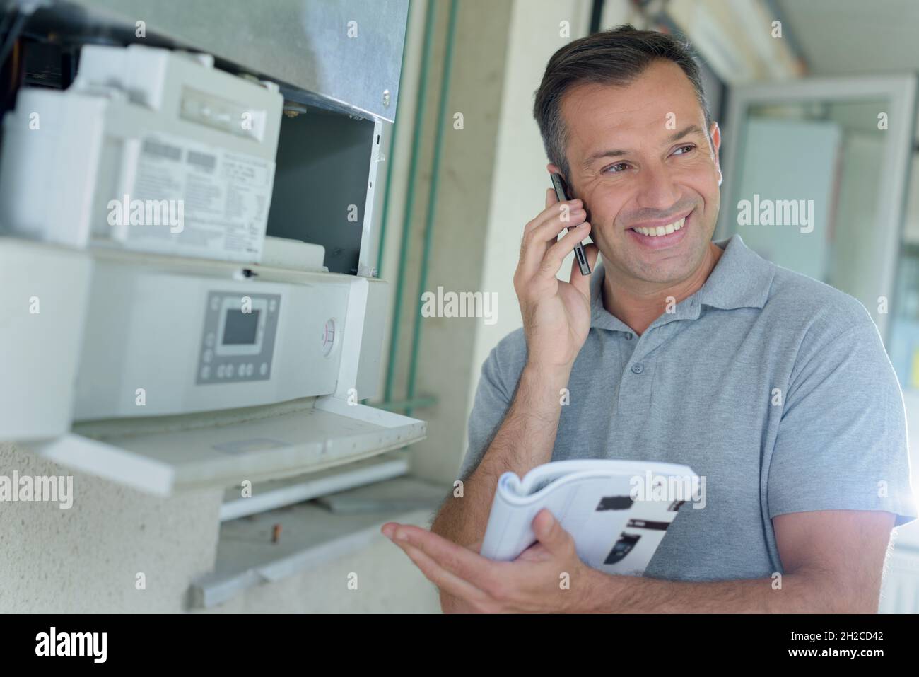 happy computer network worker on the phone Stock Photo - Alamy