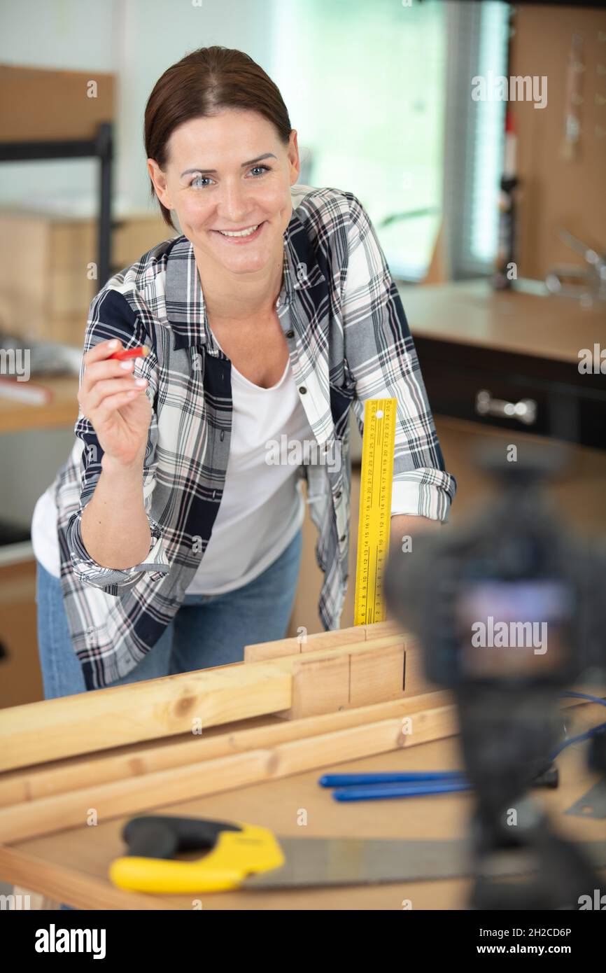 female diy blogger recording video of woorworking hobby Stock Photo - Alamy