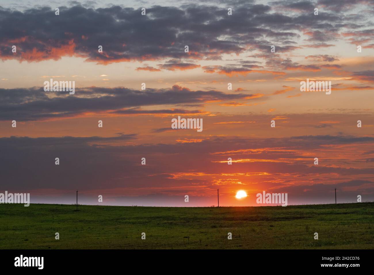 the sky at sunset far outside the city in an open field. High quality ...