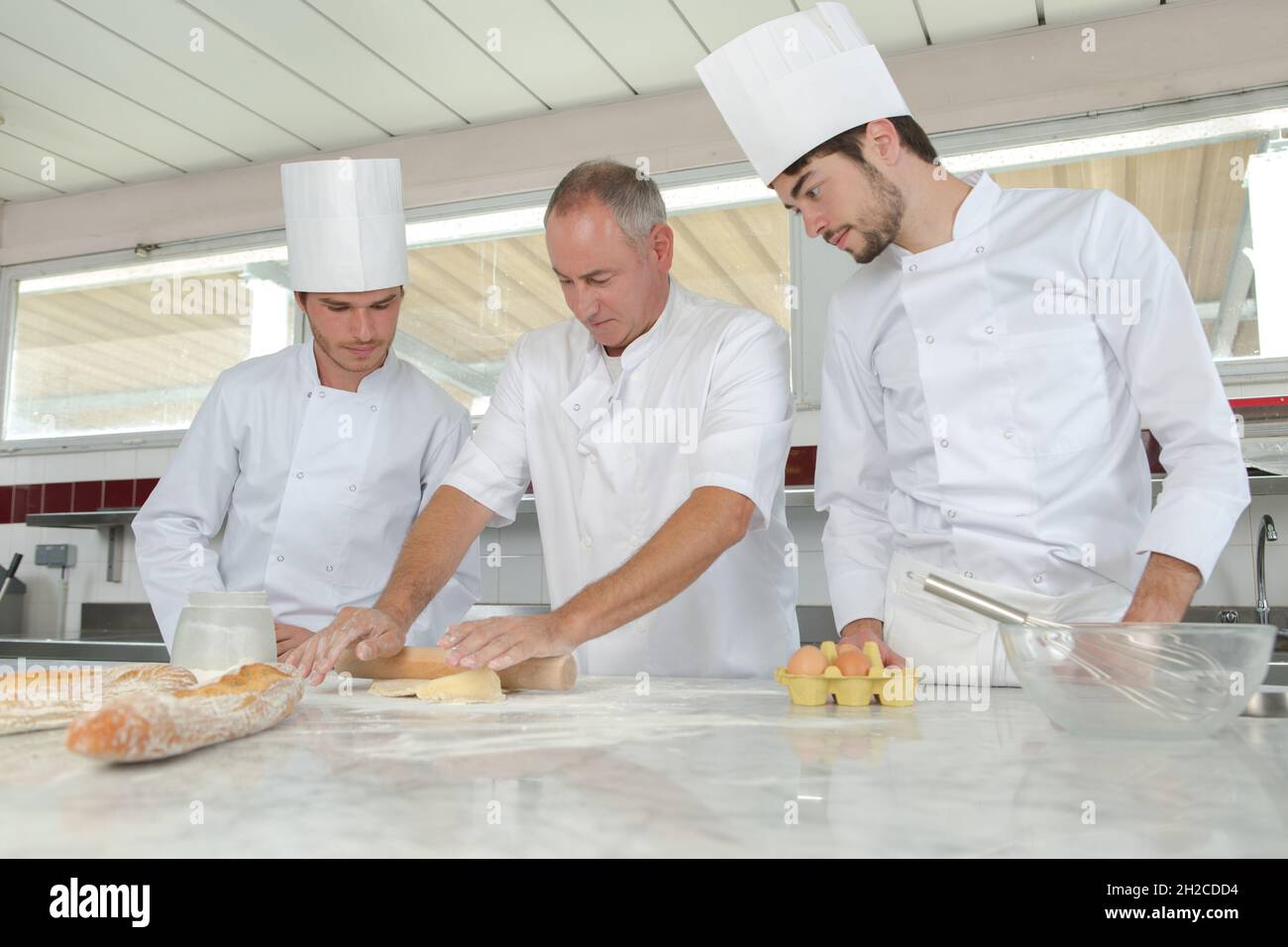 pastry trainees at work Stock Photo - Alamy