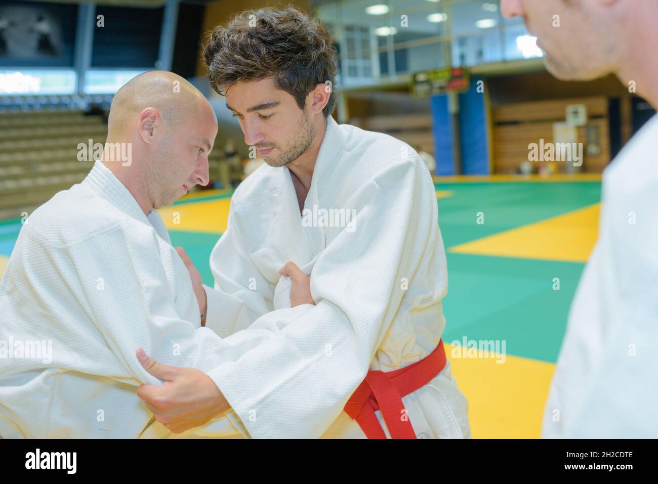 Two men competing at judo Stock Photo - Alamy