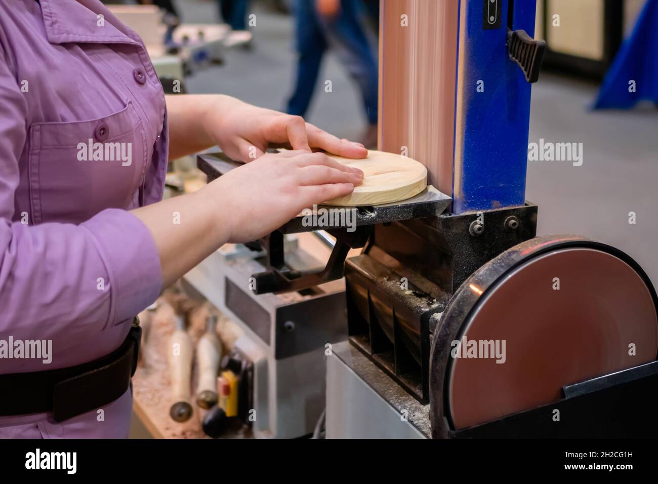 Professional woman carpenter hands using belt sander machine Stock ...