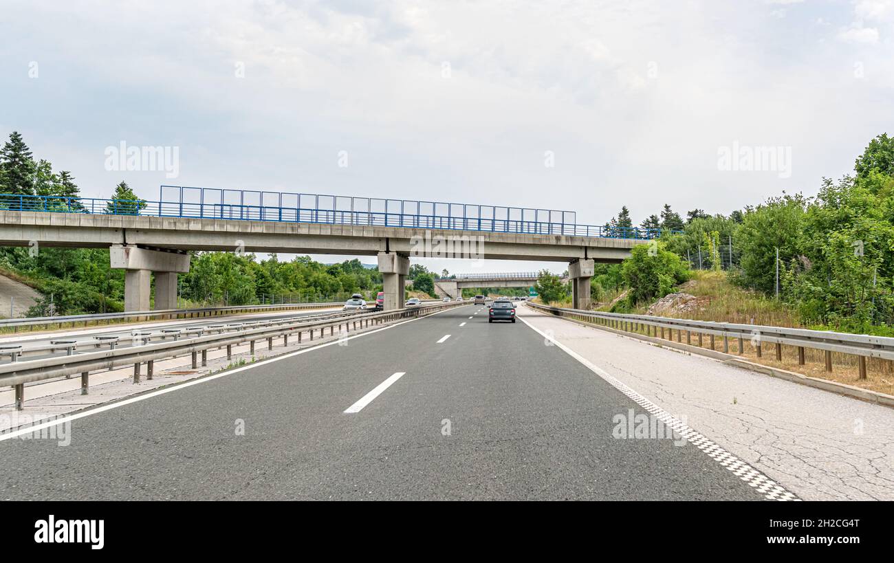Highway bridge and cars on the road Stock Photo - Alamy