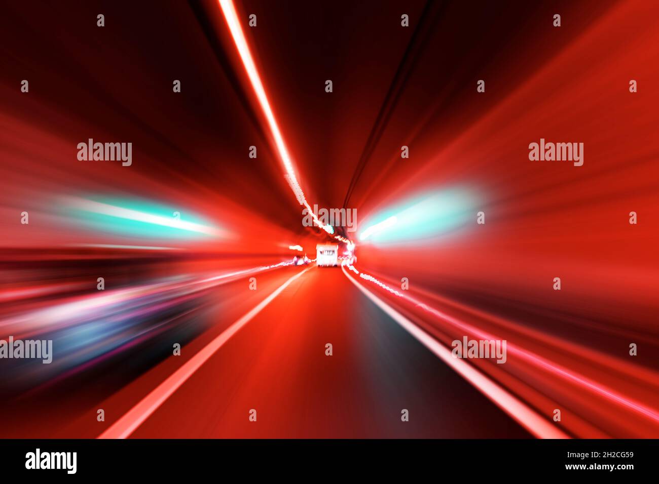 Cars rush through the tunnel in the beams of searchlights Stock Photo ...