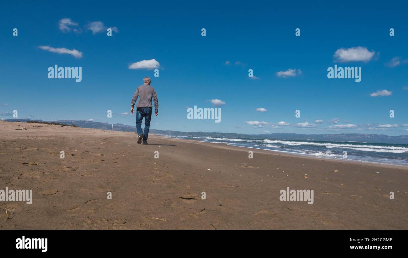 Senior man walking forward in hi-res stock photography and images - Alamy