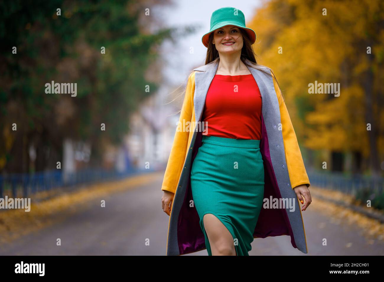 Stylish woman walking hi-res stock photography and images - Alamy