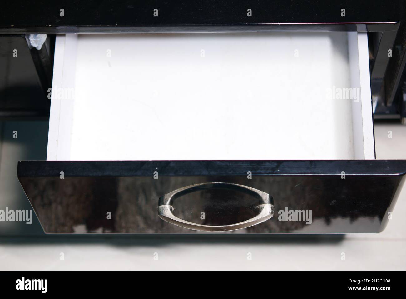 a open drawer wooden in cabinet top view Stock Photo - Alamy