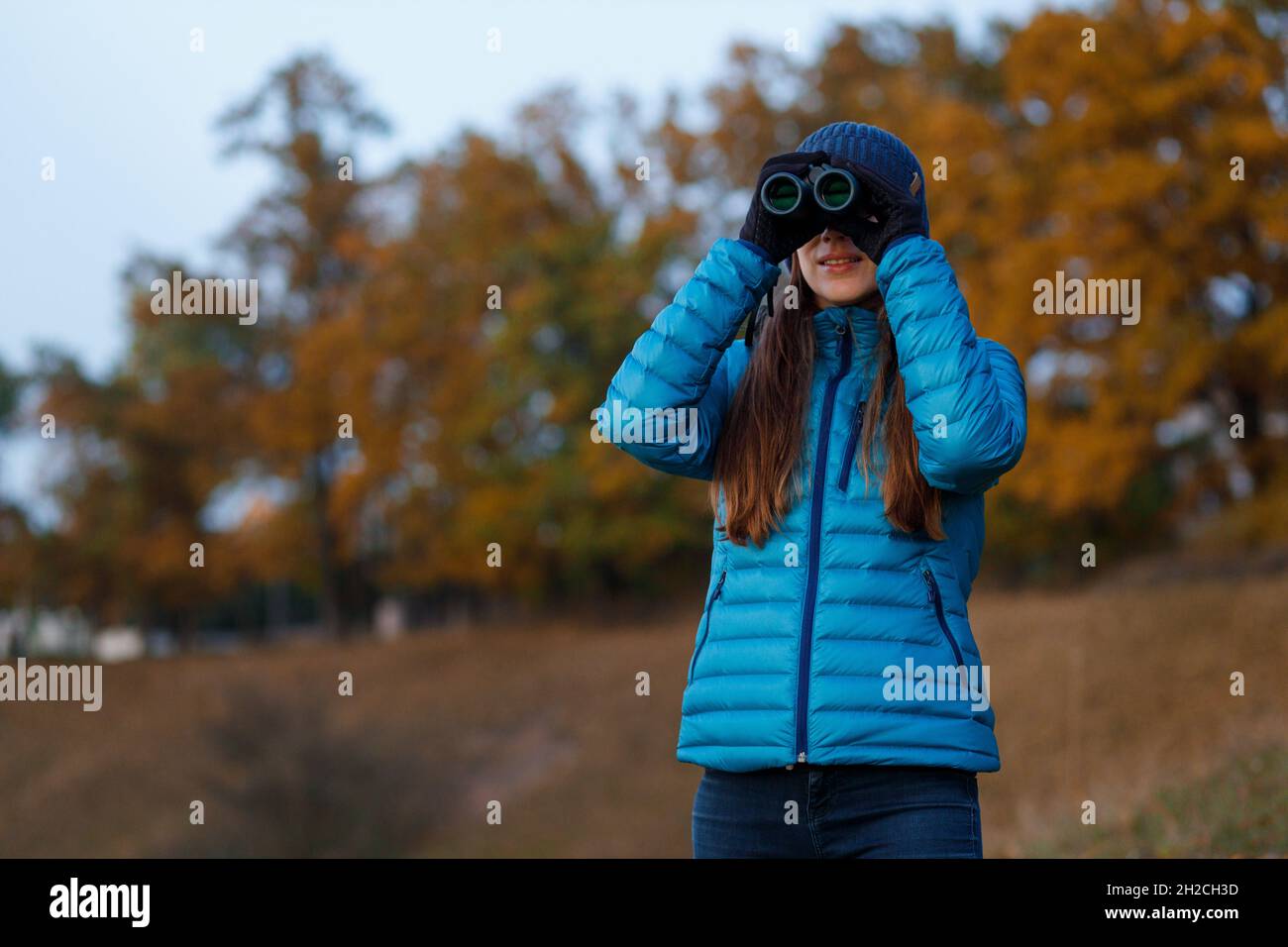 Birdwatching birdwatcher female girl woman hi-res stock photography and ...
