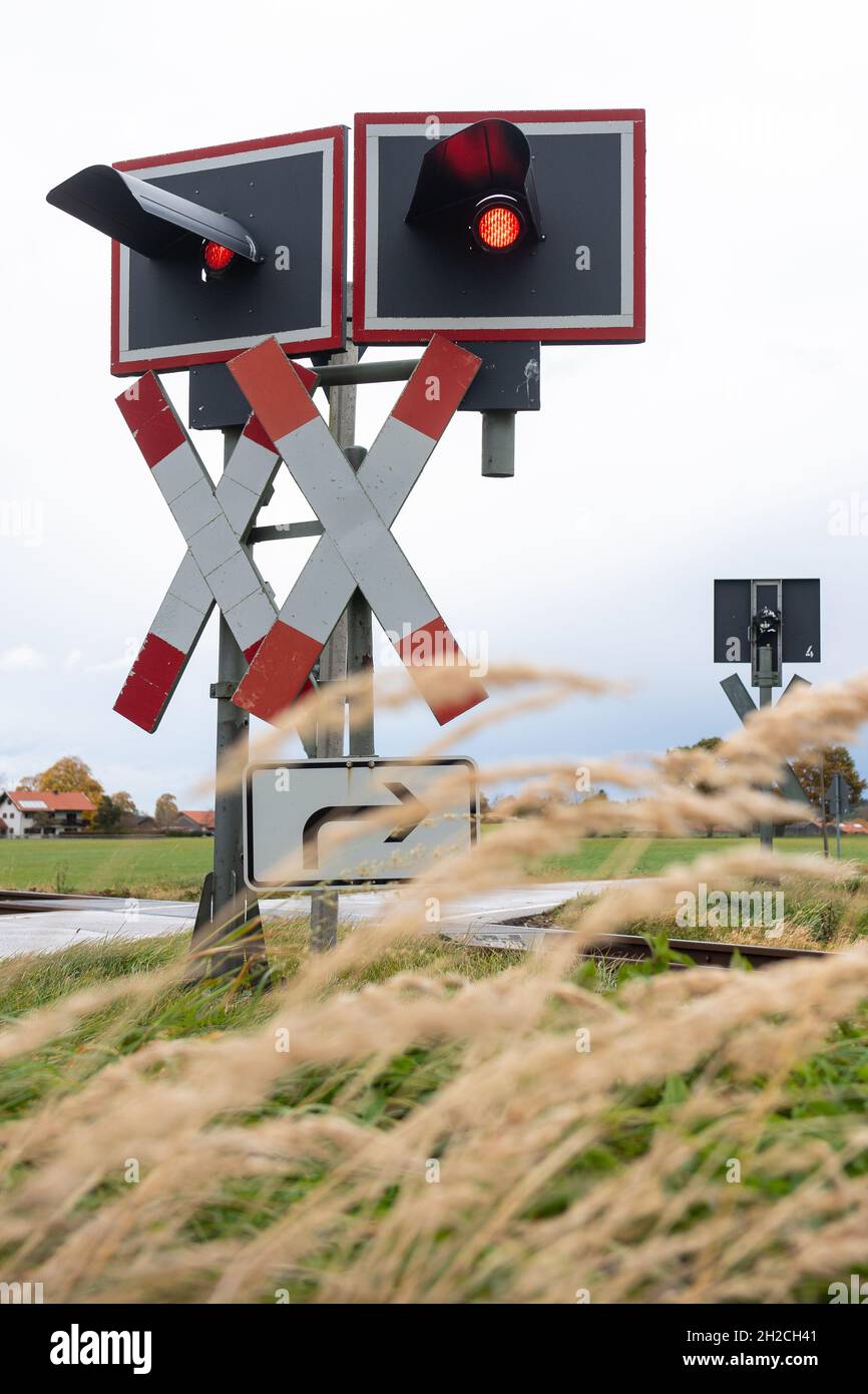Warngau, Germany. 21st Oct, 2021. Red light signals to stop at an ...