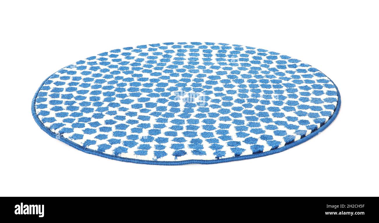 Round spotted carpet on white background Stock Photo - Alamy