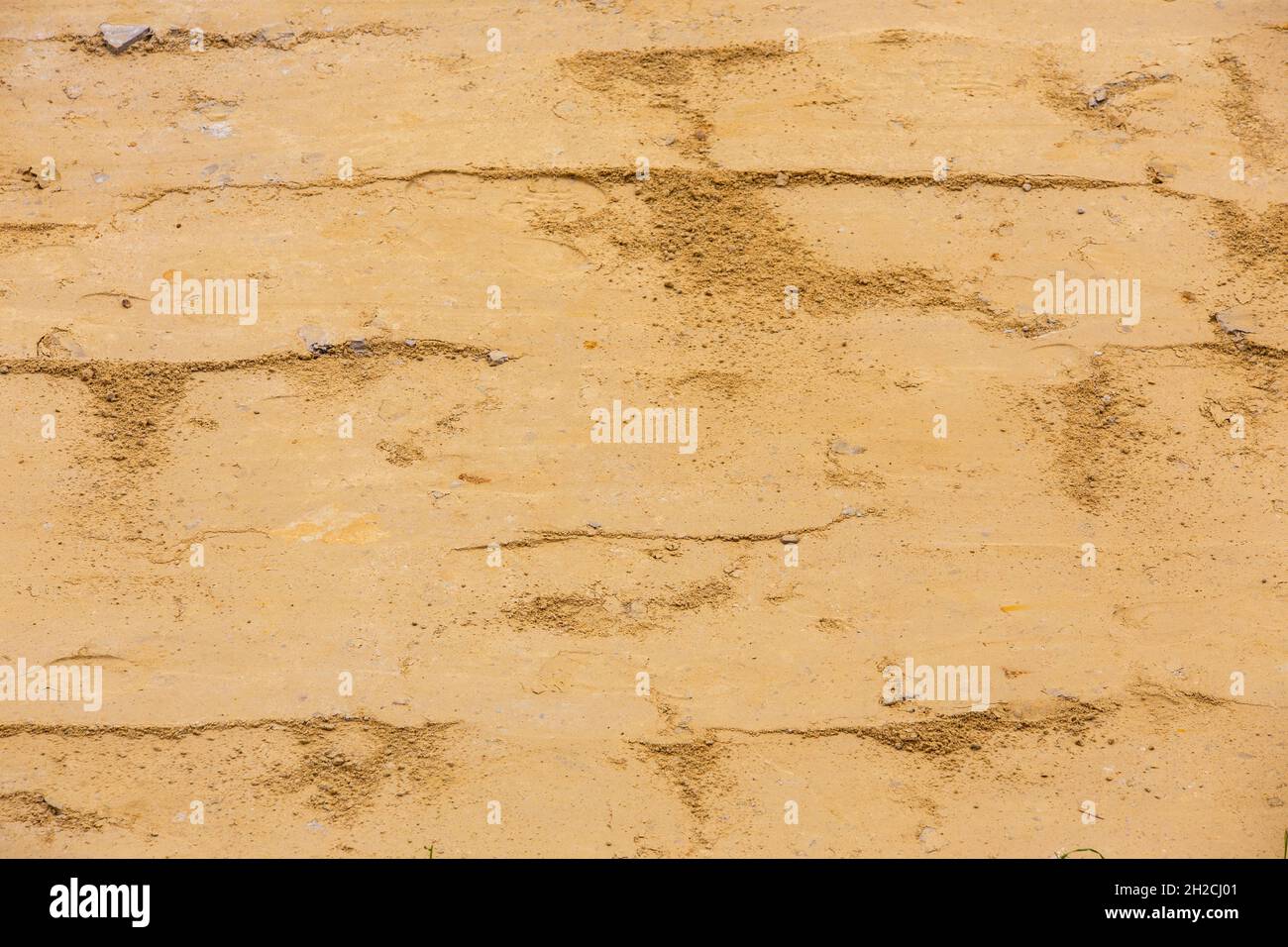close-up view of rammed sand surface compacted with vibratory plate ...
