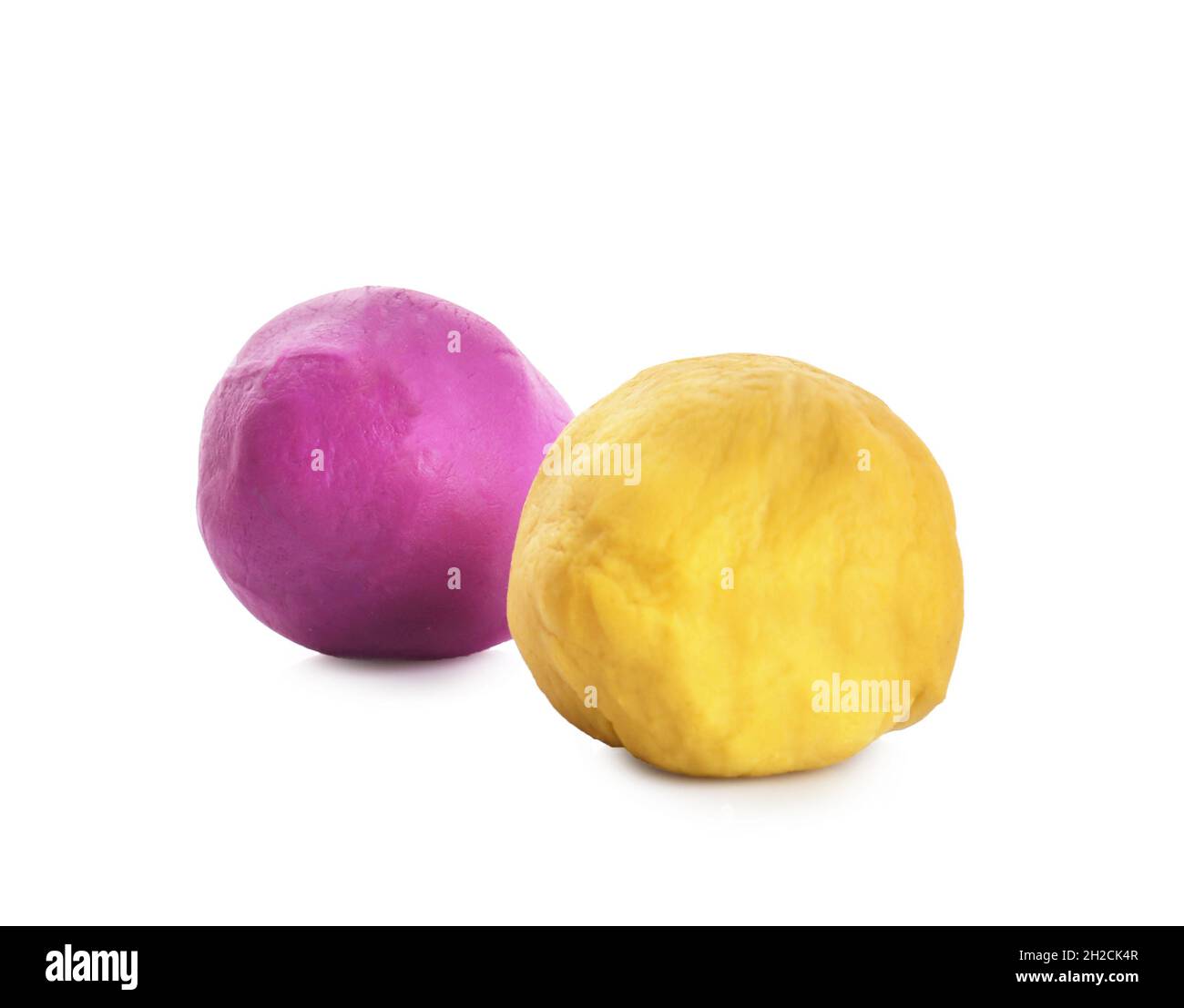 Colorful play dough on white background Stock Photo - Alamy