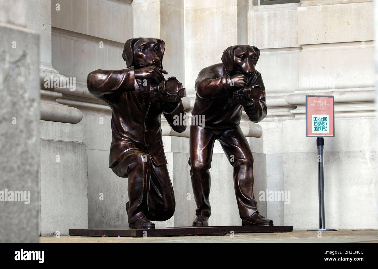 pic shows: Statues of the ‘paparazzi dogs’ near The Bank of England in ...