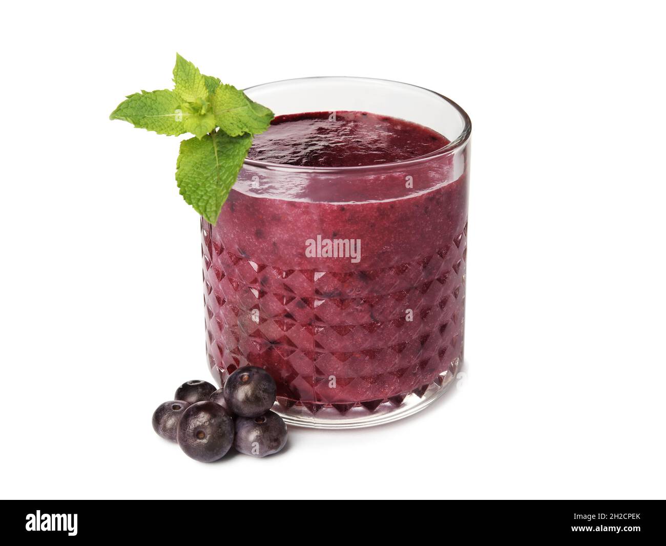 Glass with delicious acai smoothie on white background Stock Photo - Alamy