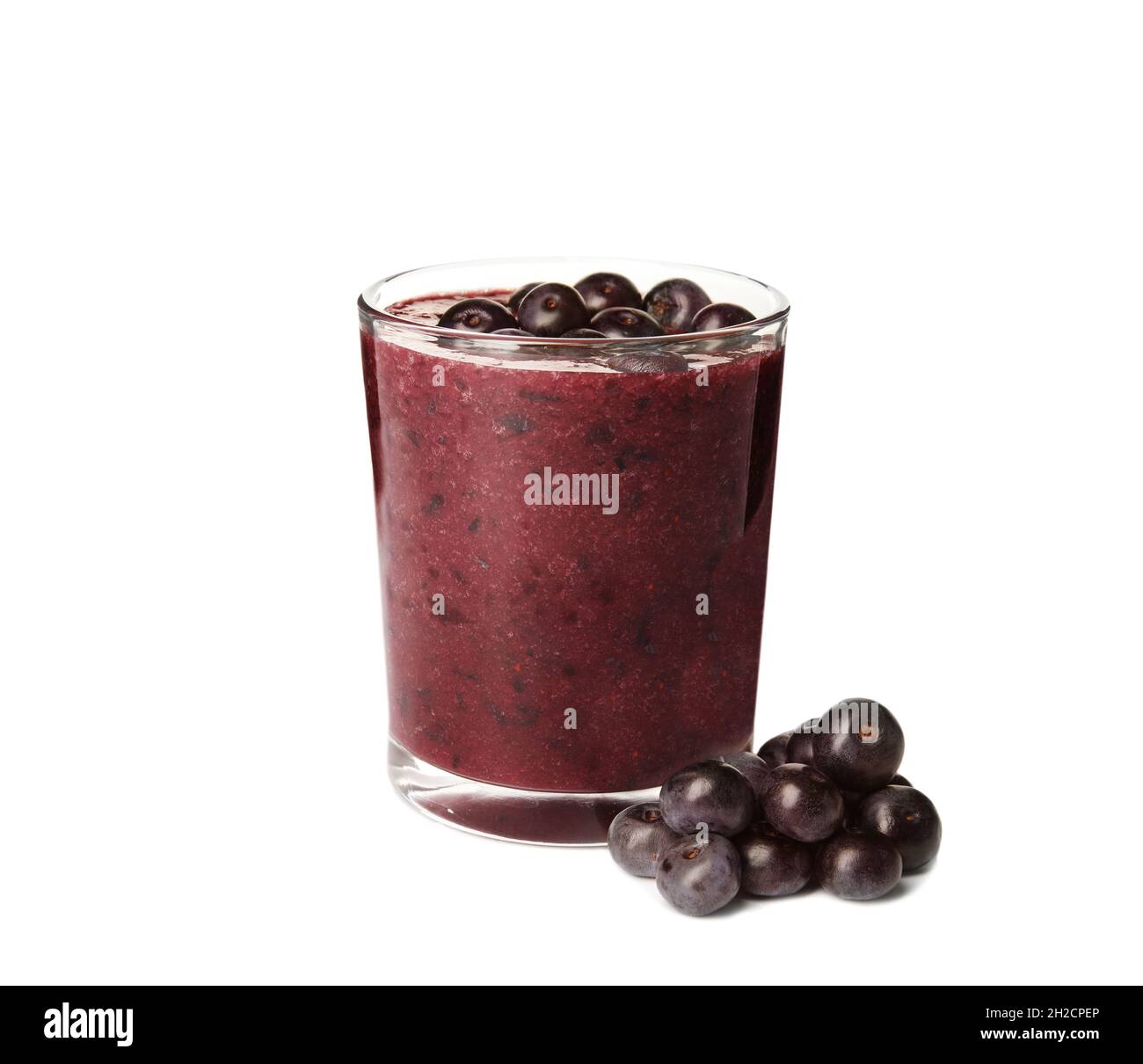 Glass with delicious acai smoothie on white background Stock Photo - Alamy