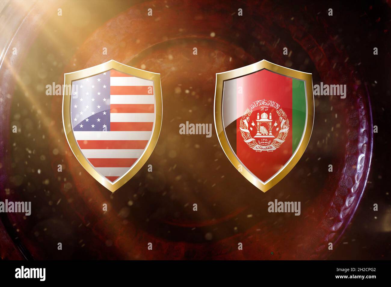 us and Afghanistan flag in golden shield on copper texture background ...