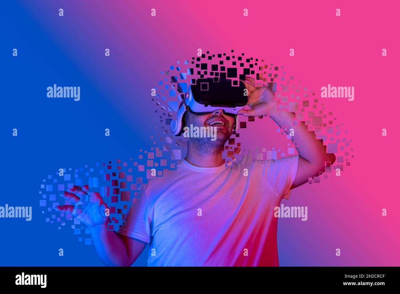 young man enters virtual world with vr glasses. Introduction to the new ...