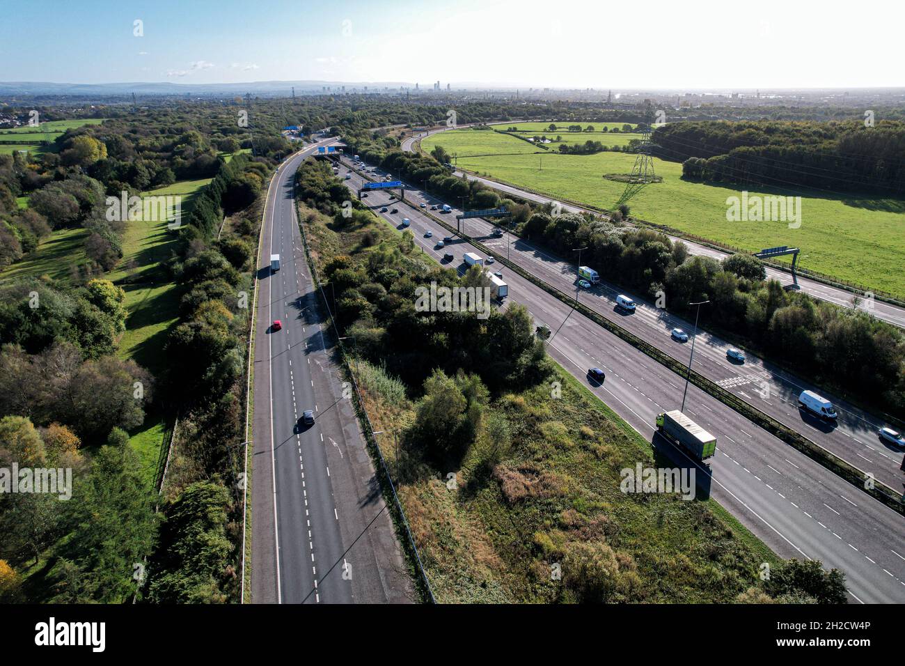 Aerial top view of road junction motorway from above, automobile ...