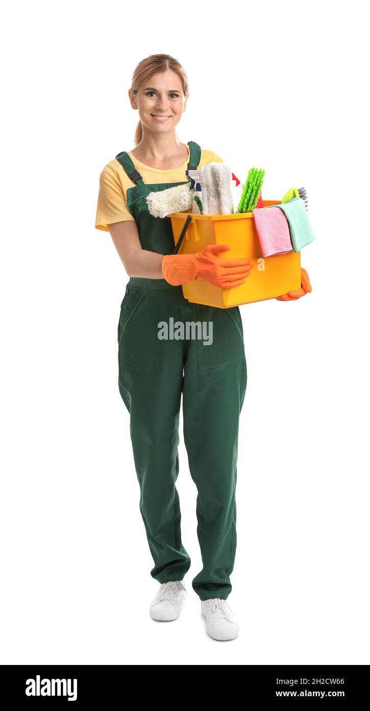 Female janitor with cleaning supplies on white background Stock Photo ...