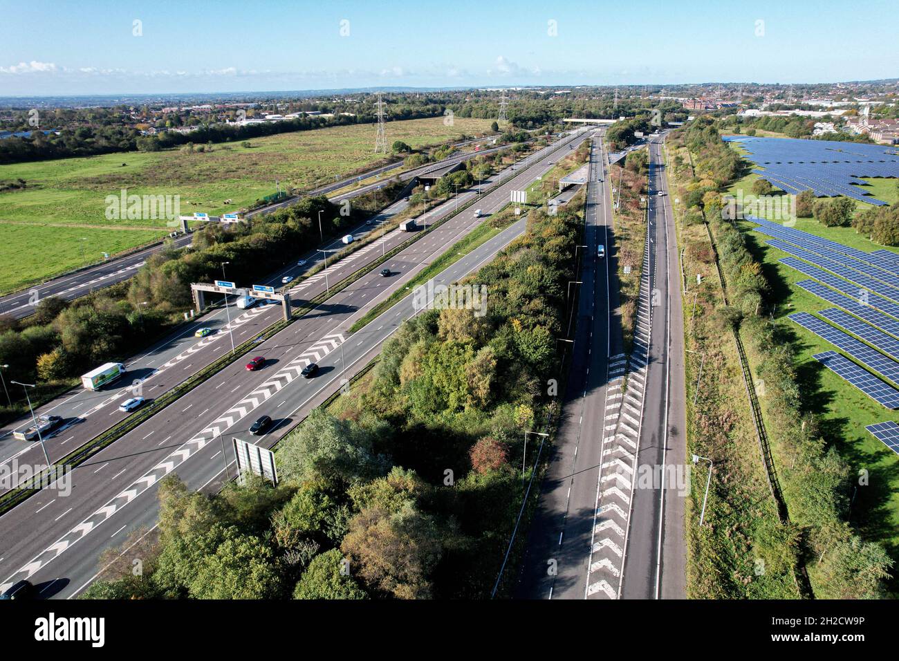Aerial top view of road junction motorway from above, automobile ...