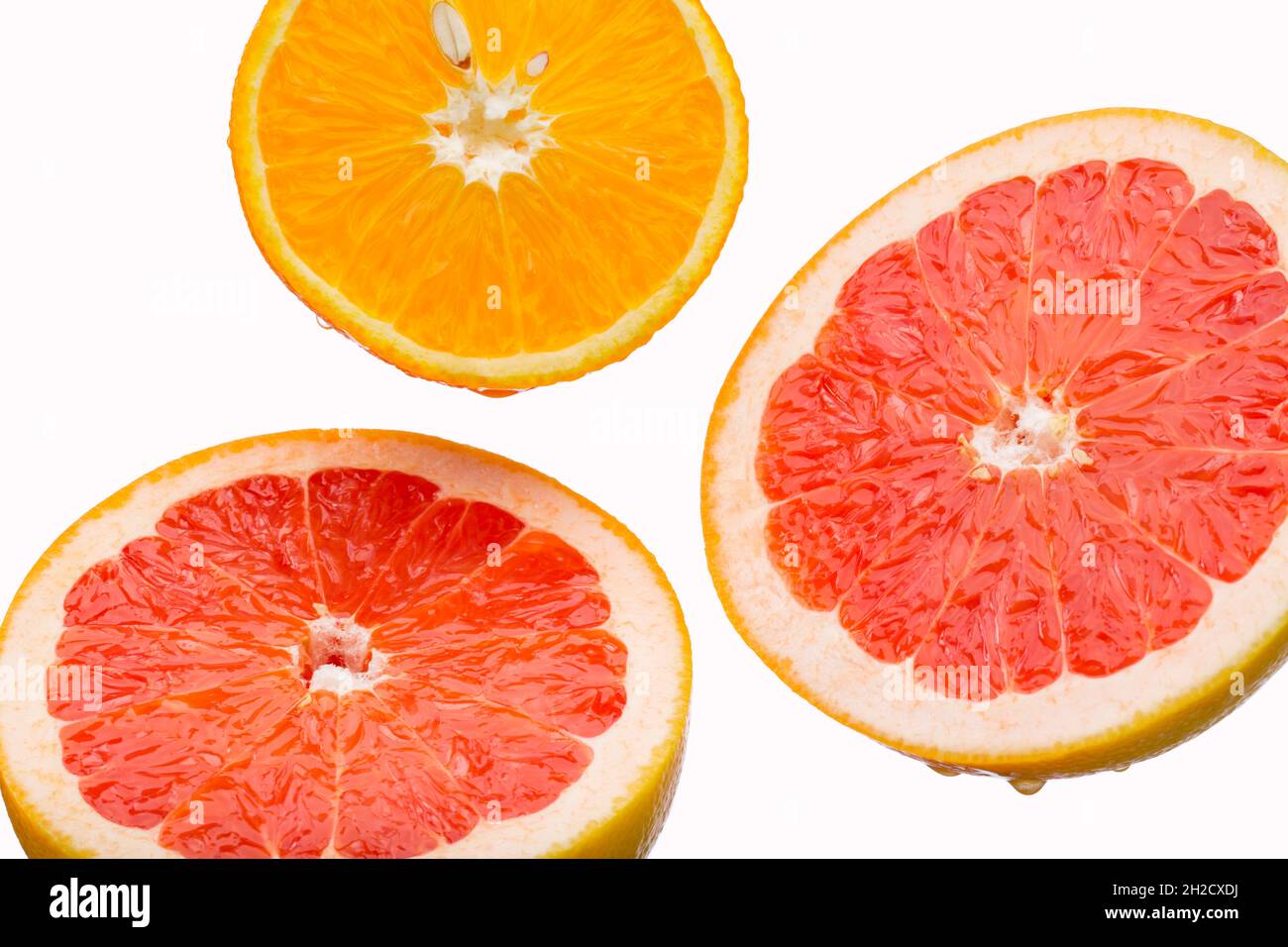 Grapefruit half isolated on white background Stock Photo - Alamy