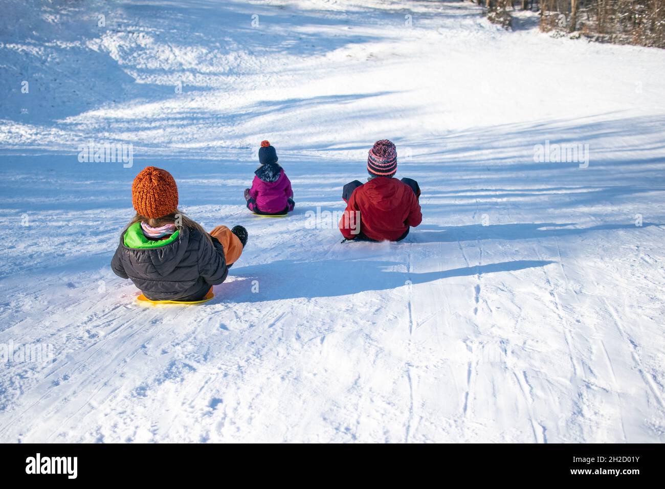 Kids playing downhill hi-res stock photography and images - Alamy