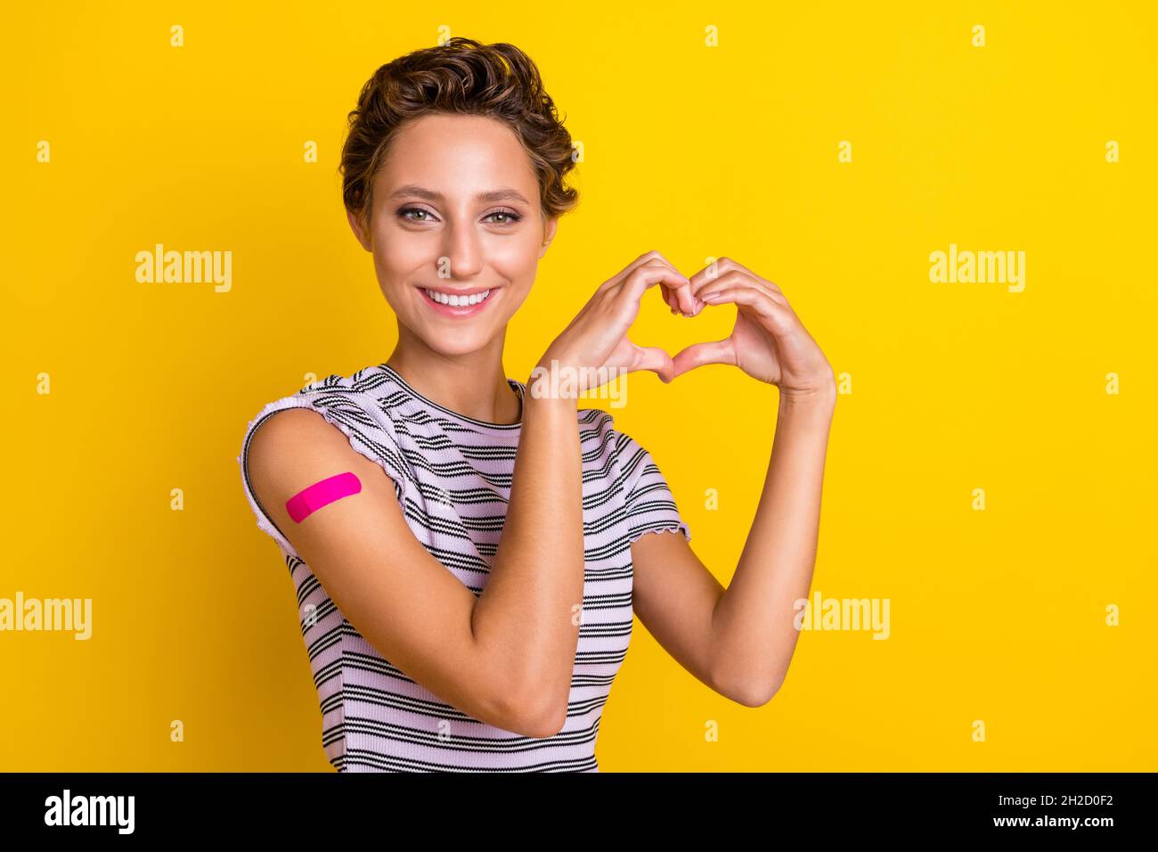 Photo Of Lovely Millennial Brown Hairdo Lady Show Heart Vaccinated Wear