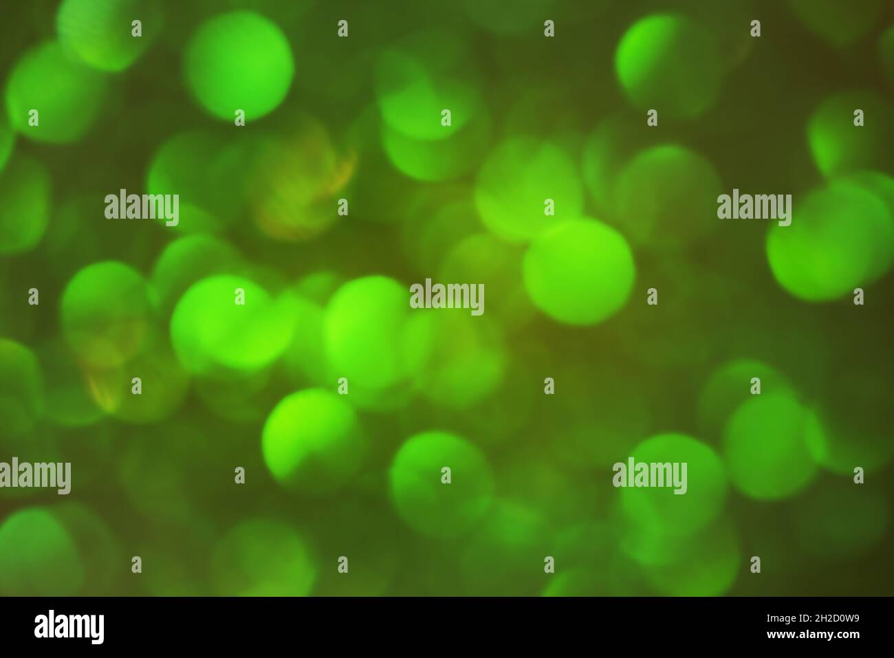 Round shape defocus lights are green. Blurred bokeh. Material for the ...