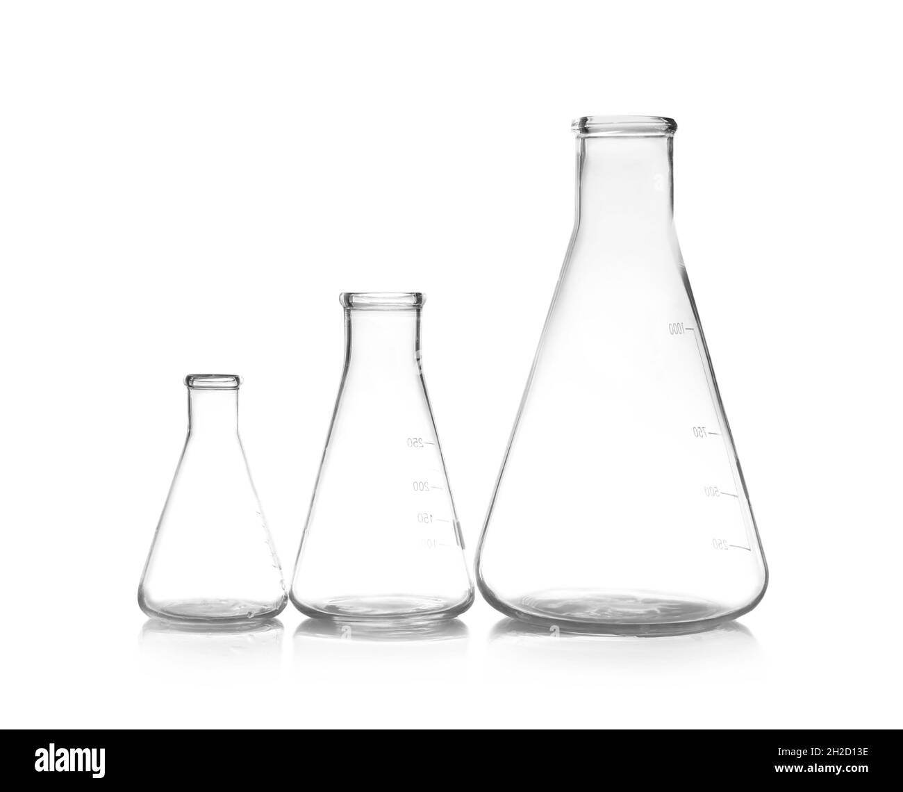 Empty conical flasks on table. Laboratory analysis Stock Photo - Alamy