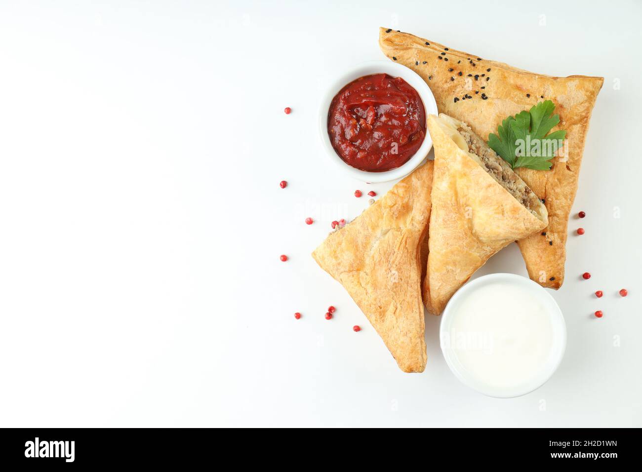 Concept of tasty food with samsa on white background Stock Photo - Alamy