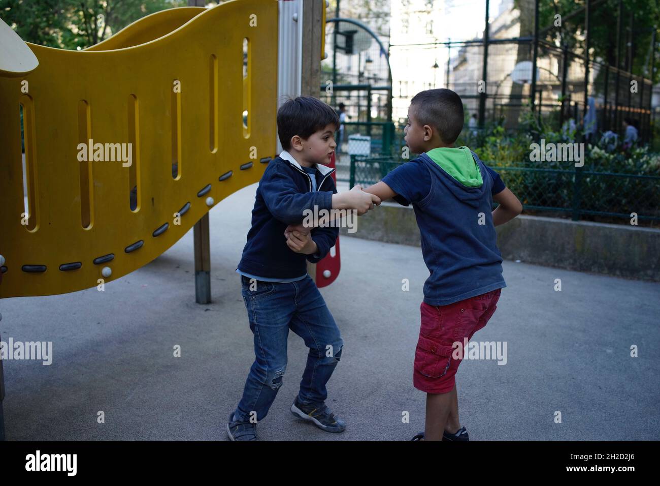 Children Fighting On Playground