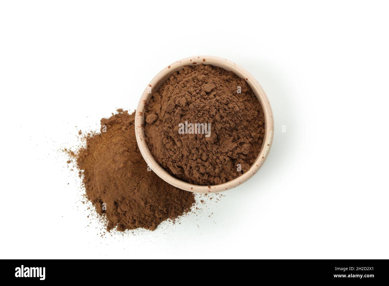 Cocoa powder in bowl isolated on white background Stock Photo - Alamy