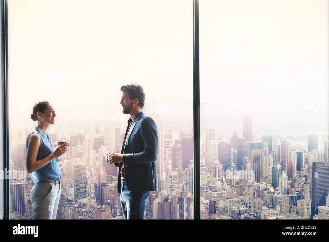 She's always ready to help her colleagues Stock Photo - Alamy