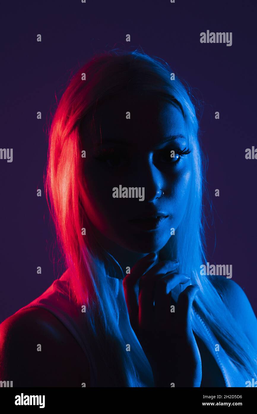 Portrait of a young Canadian woman with platinum blonde hair posing ...