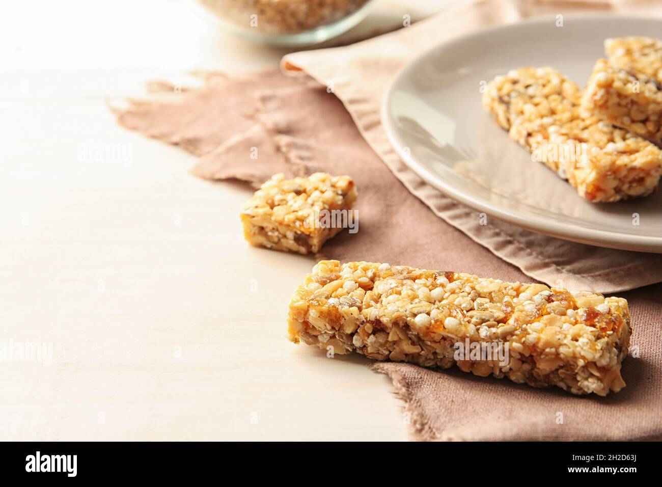 Homemade grain cereal bar on table, closeup. Healthy snack Stock Photo ...