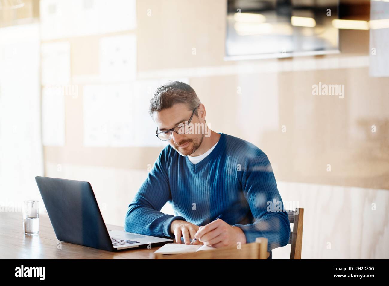 Planning his day Stock Photo - Alamy