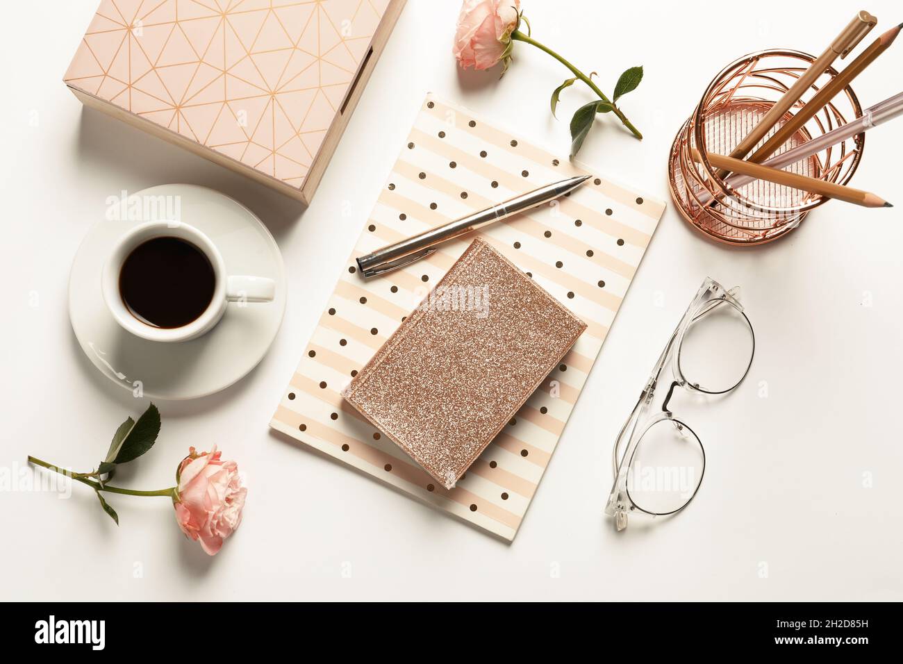 Flat lay composition with notebooks, cup of coffee and stationery on ...