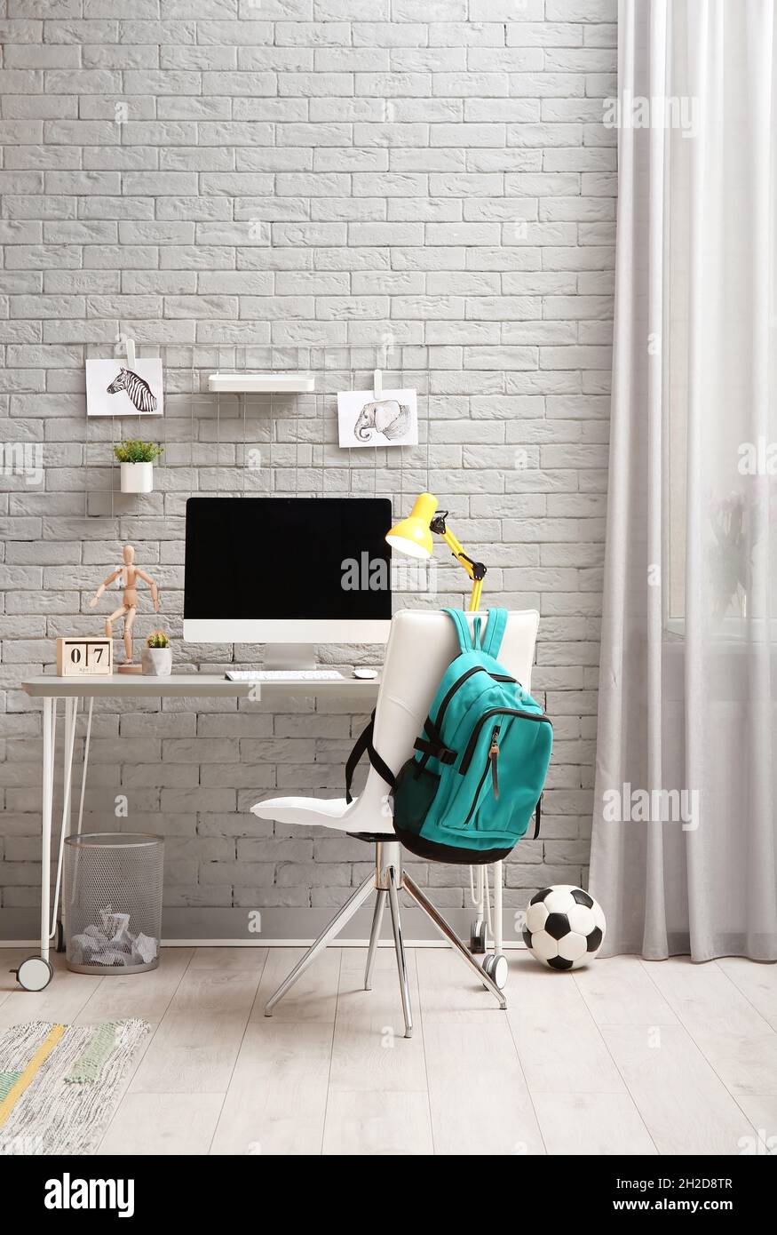 Comfortable workplace with modern computer in child room Stock Photo ...