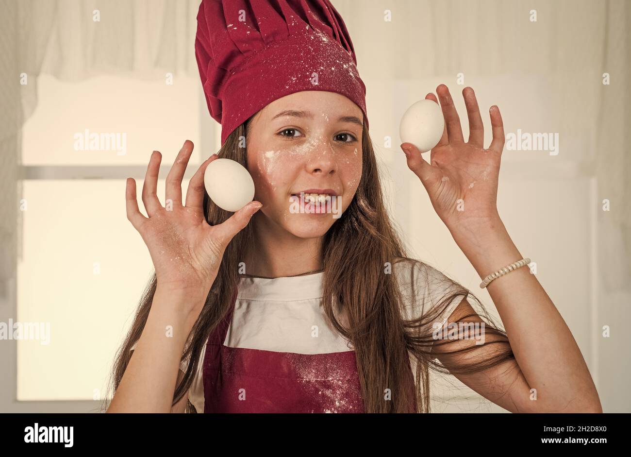 So tasty. teen girl chef wearing uniform. child study how to cook by ...