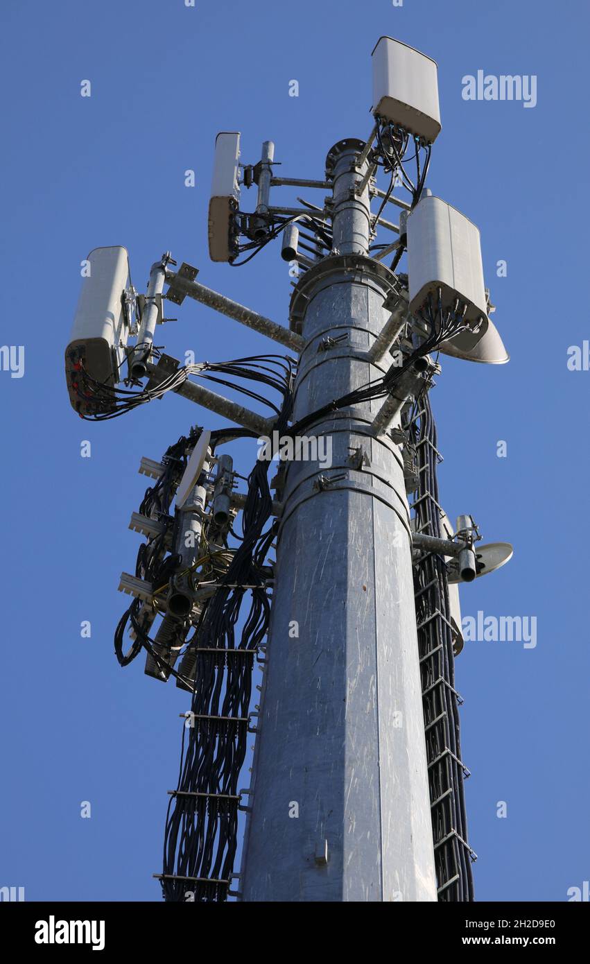 pole with mobile phone repeaters for receiving data and phone calls ...
