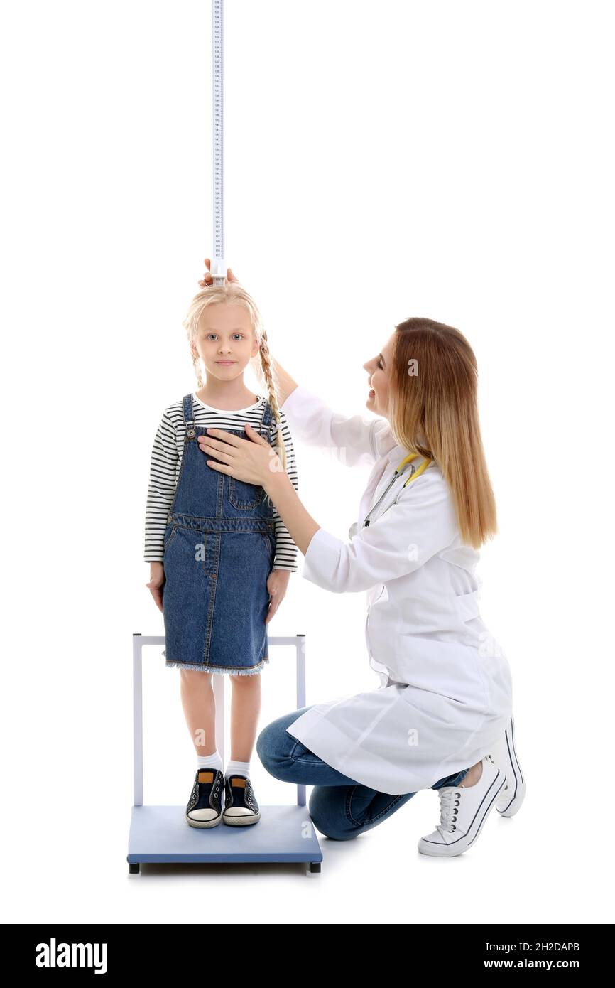 Doctor checking height child hi-res stock photography and images - Alamy