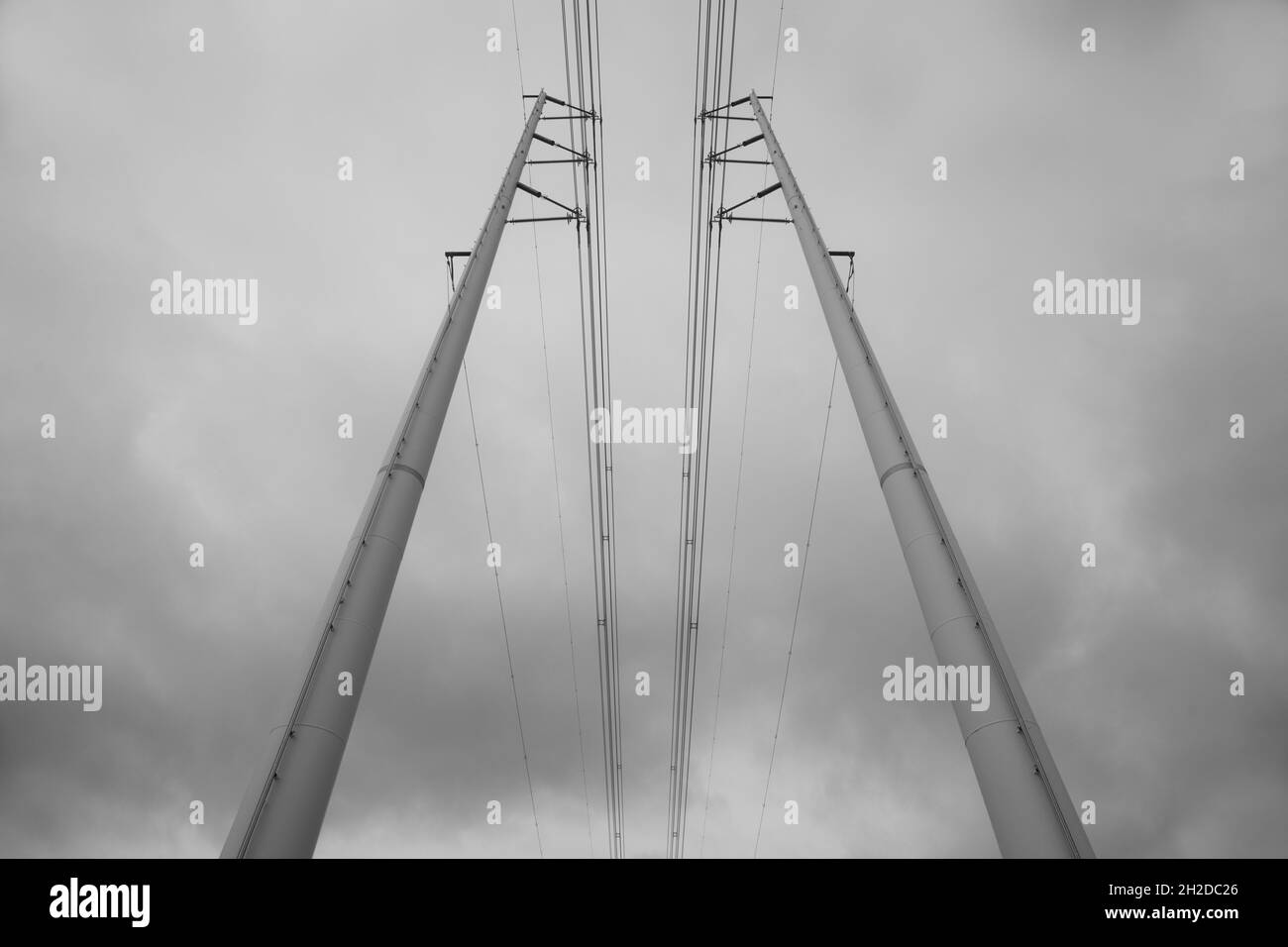 Electricity wires fading in the distance Stock Photo - Alamy