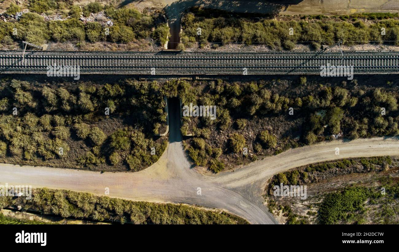 Aerial view of a tunnel crossing a train track Stock Photo - Alamy