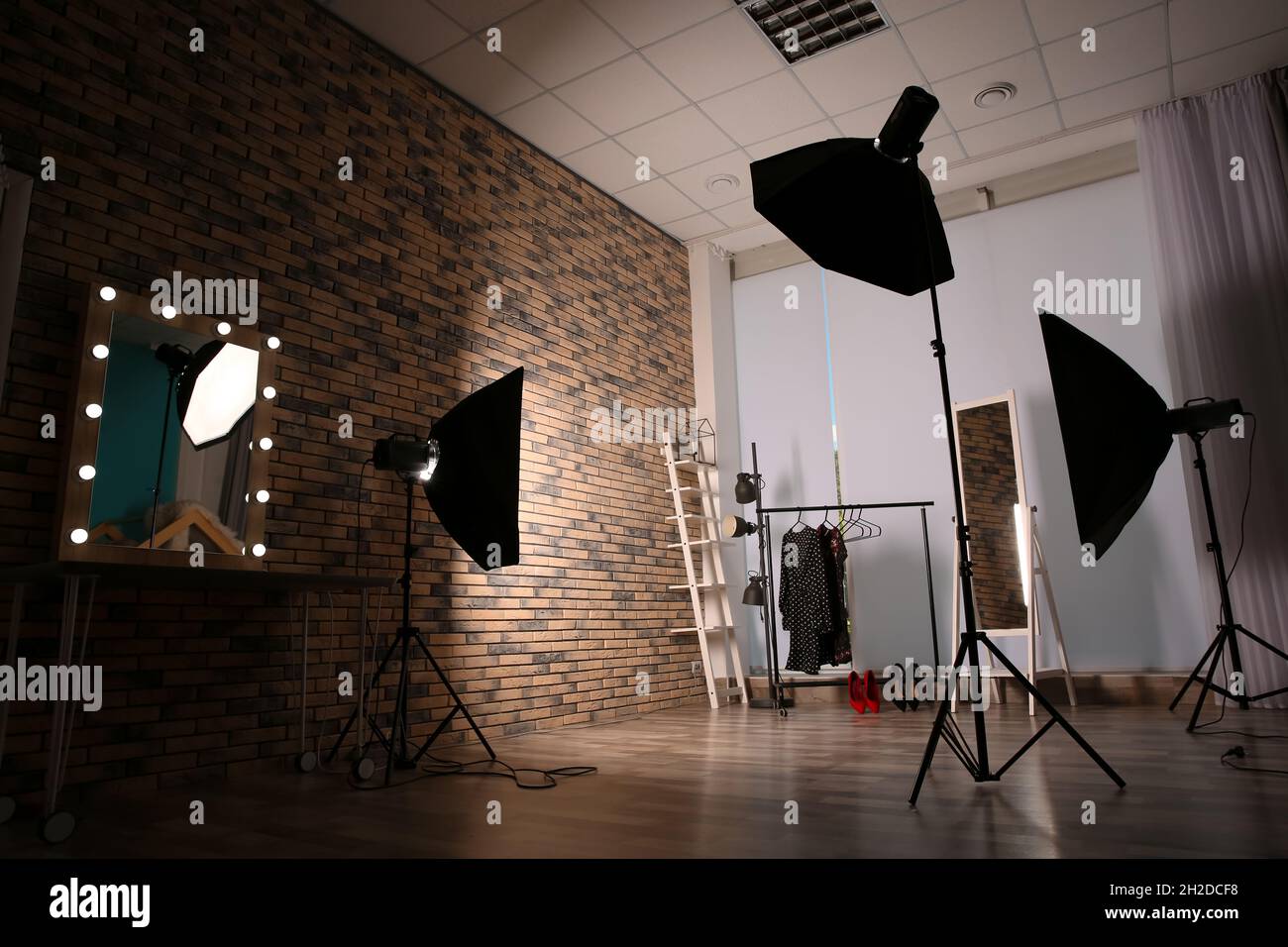 Interior of modern photo studio with professional equipment Stock Photo ...