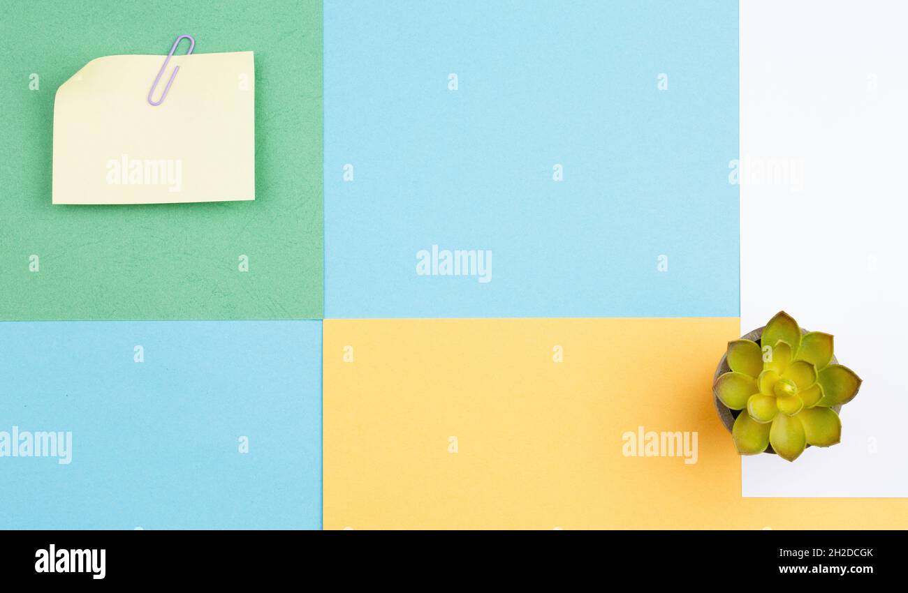Colored paper with binders and note paper Stock Photo - Alamy