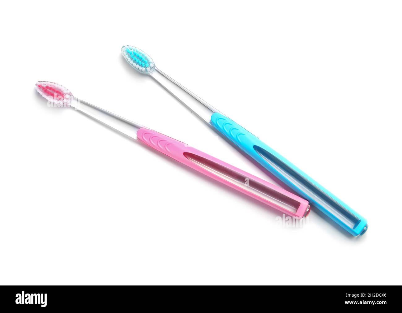 Color toothbrushes on white background. Dental care Stock Photo - Alamy
